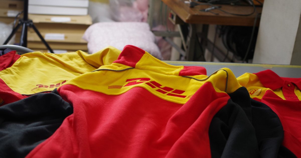 Recycled and renewed DHL uniforms continue delivering joy | DHL ...